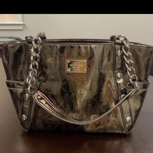 Michael Kors | Accessories | Michael Kors Silver Metallic Purse | Poshmark